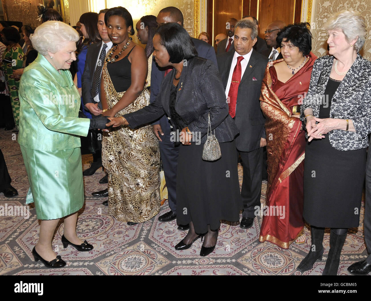 Britain's Queen Elizabeth II meets guests at the Commonwealth Day ...