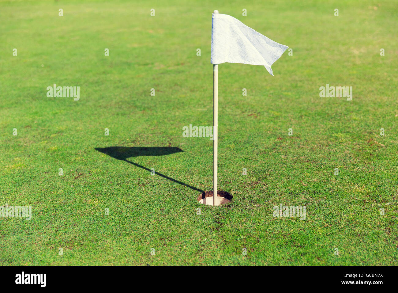 Shadow of golf flag hi-res stock photography and images - Alamy