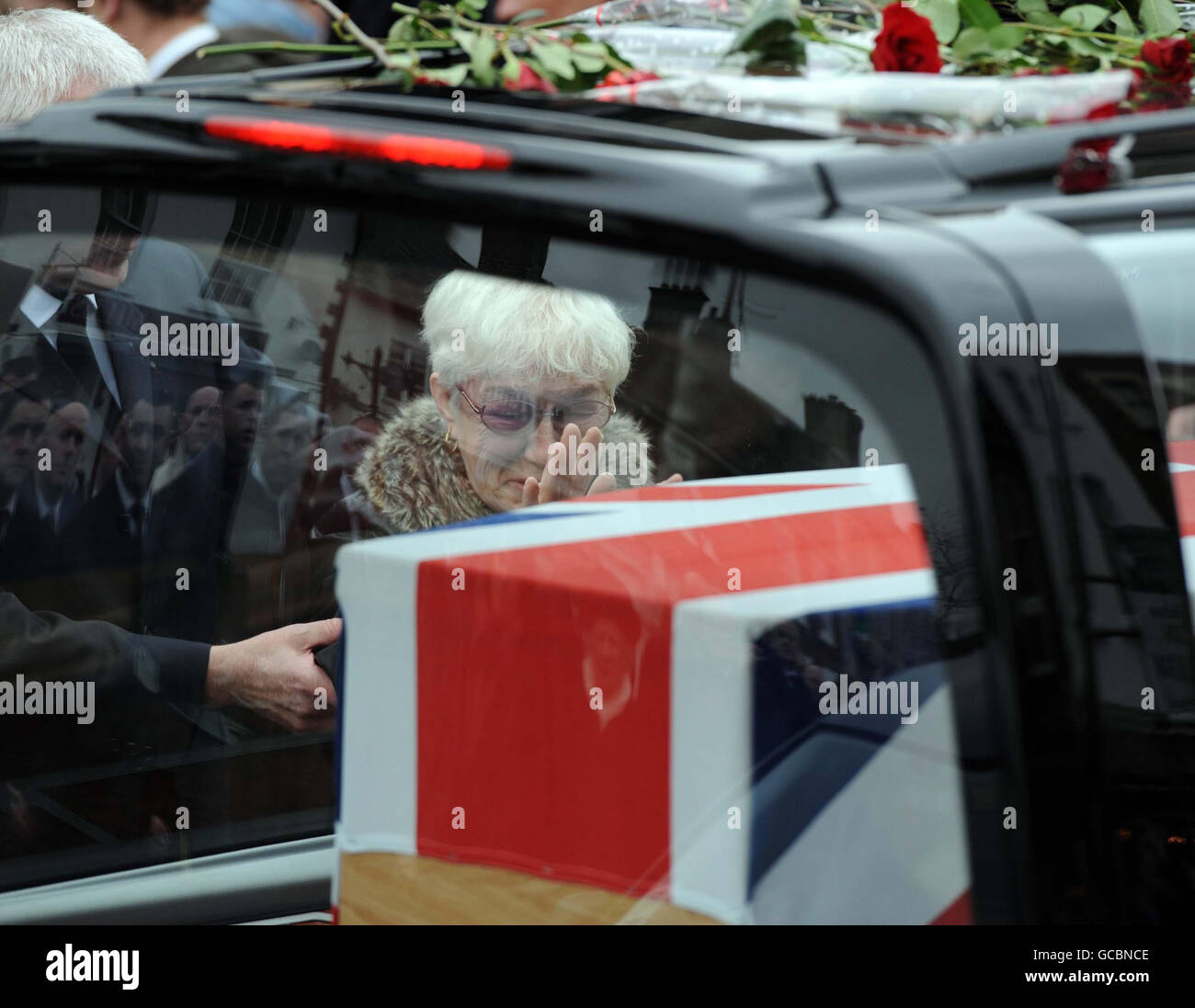 Mary Walker with the coffin of her son Lance Sergeant David Walker as ...