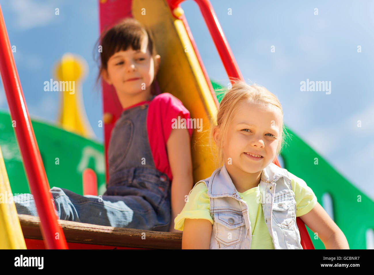 happy kids on children playground Stock Photo - Alamy