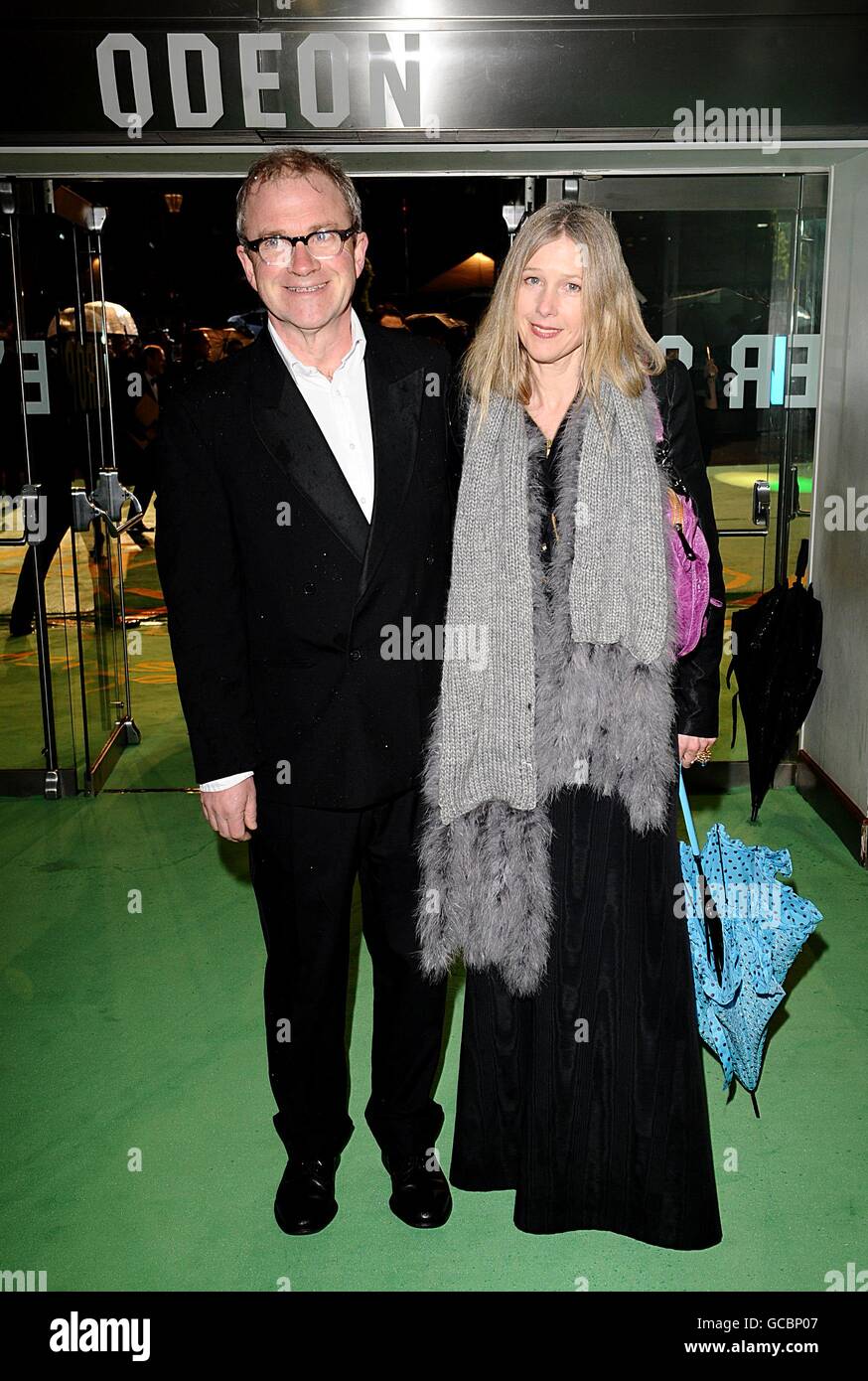 Harry Enfield and his wife Lucy arriving for the Royal world premiere ...