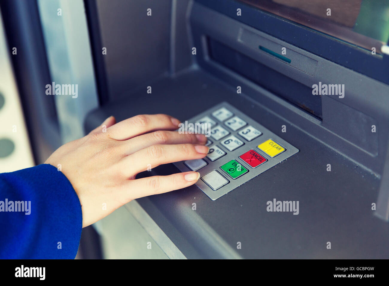 close up of hand entering pin code at cash machine Stock Photo - Alamy