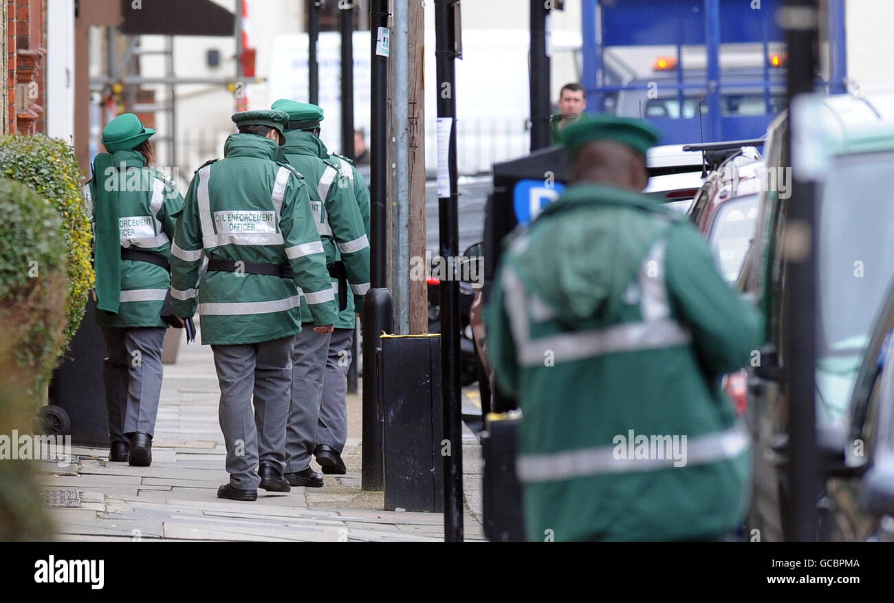 Five Civil Enforcement Officers patrol a street in Clapham, London ...