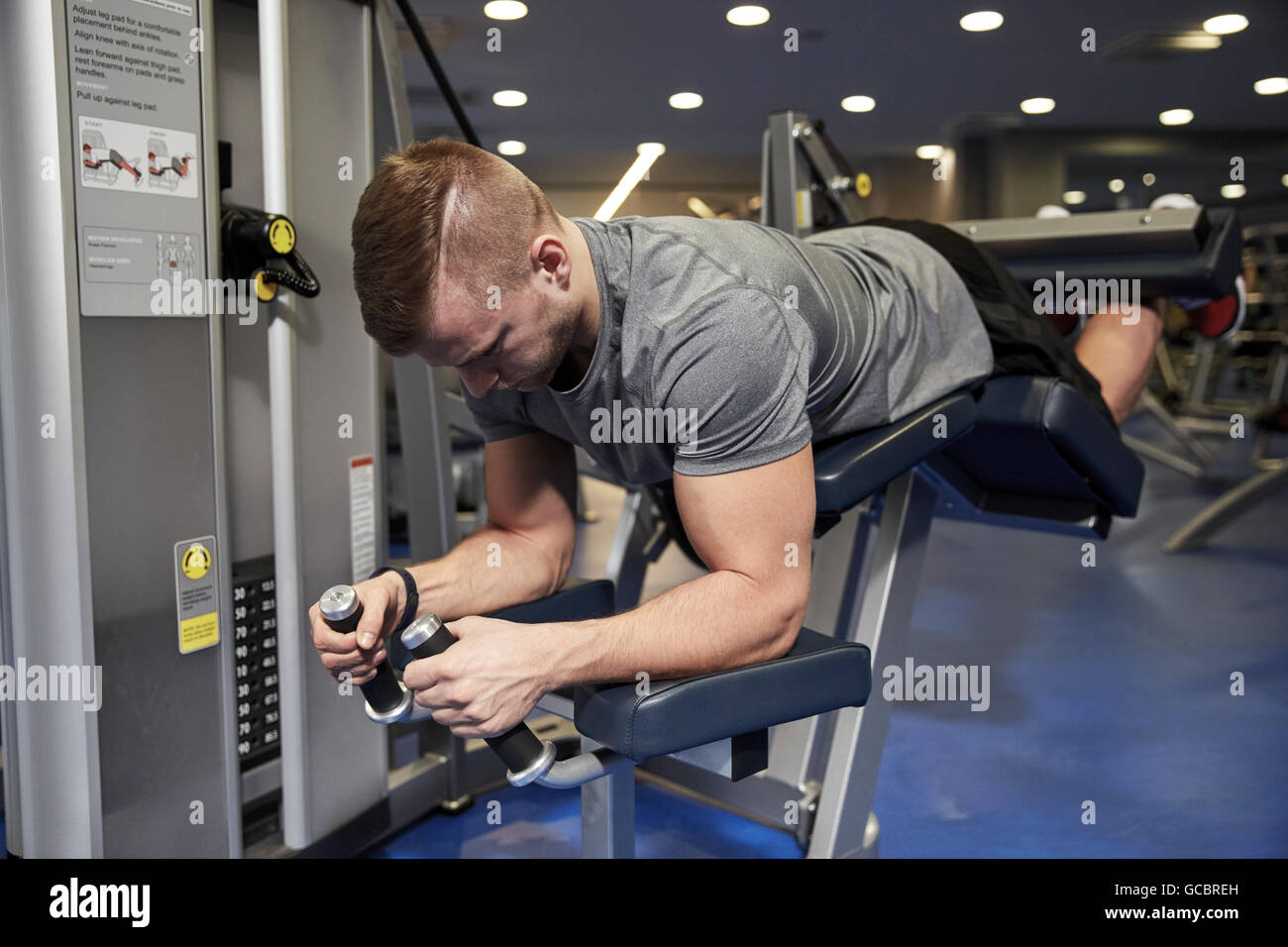 Man leg curl gym hi-res stock photography and images - Alamy