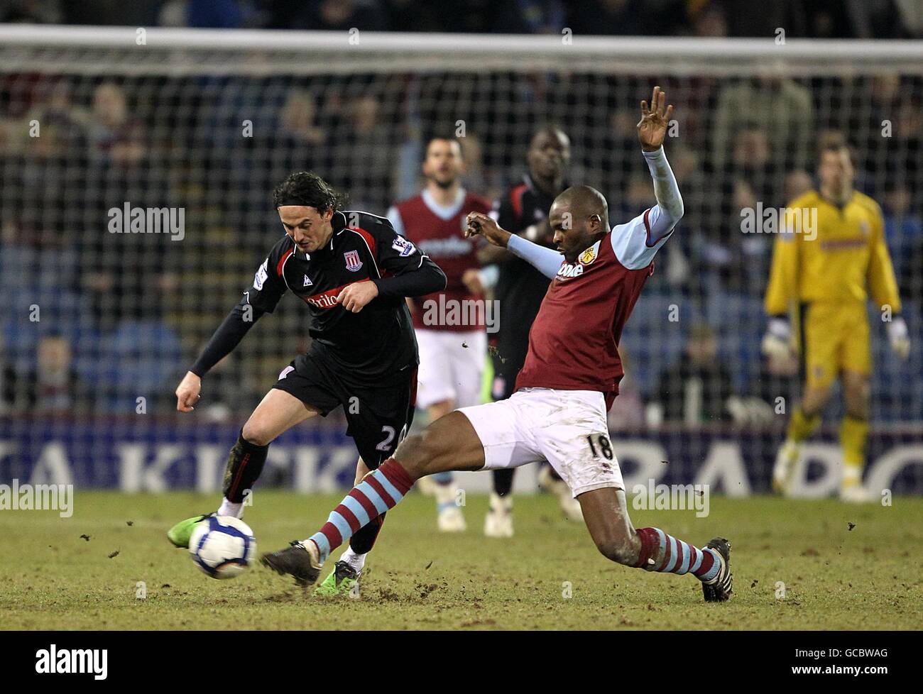 Burnley's Leon Cort (right) and Stoke City's Tuncay Sanli (left) battle ...