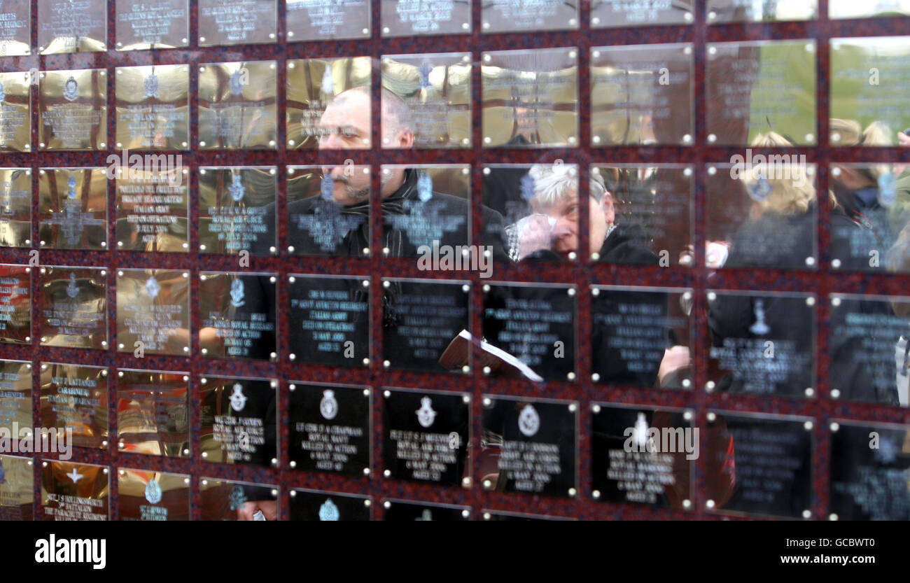 Members of the public view the Basra Memorial Wall at the National ...