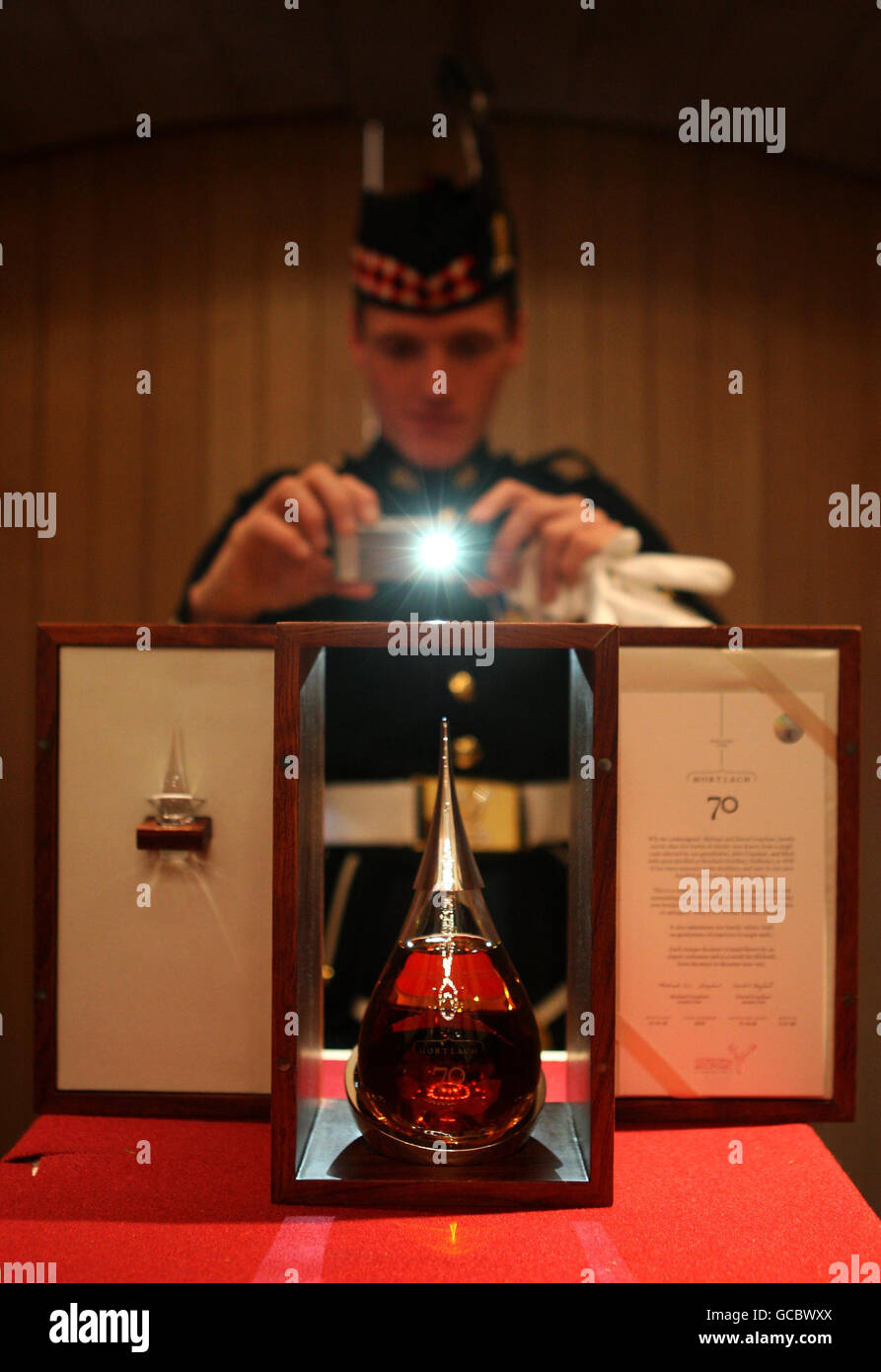 Lance Cpl Alan Leiper from the Royal Regiment of Scotland photographs a ...