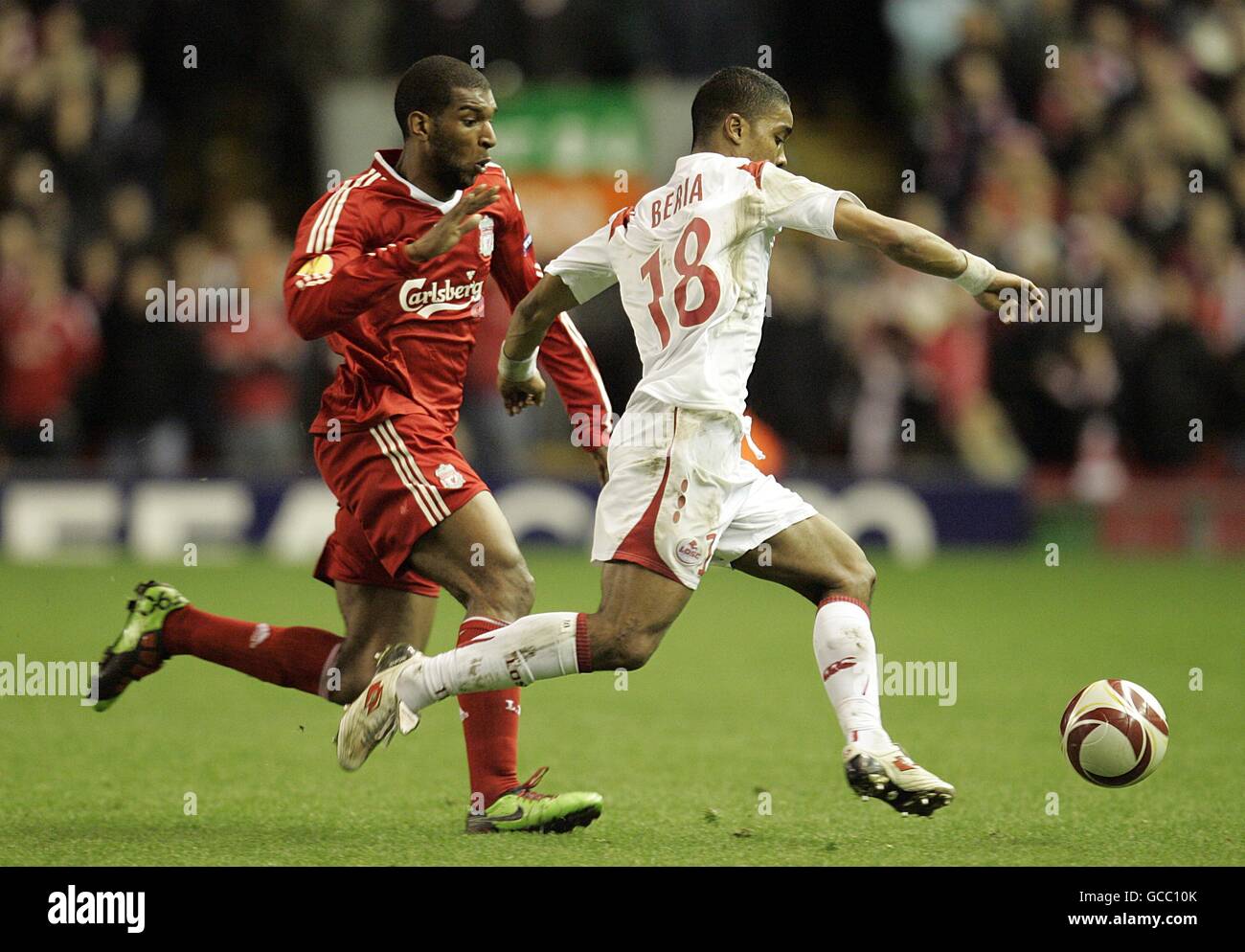 Liverpool's Ryan Babel (left) and Lille's Franck Beria (right) in ...