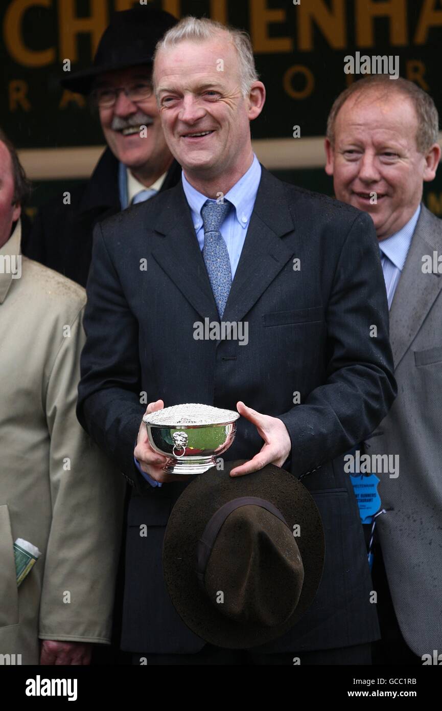 Trainer Willie Mullins celebrates Katie Walsh winning the Vincent O ...