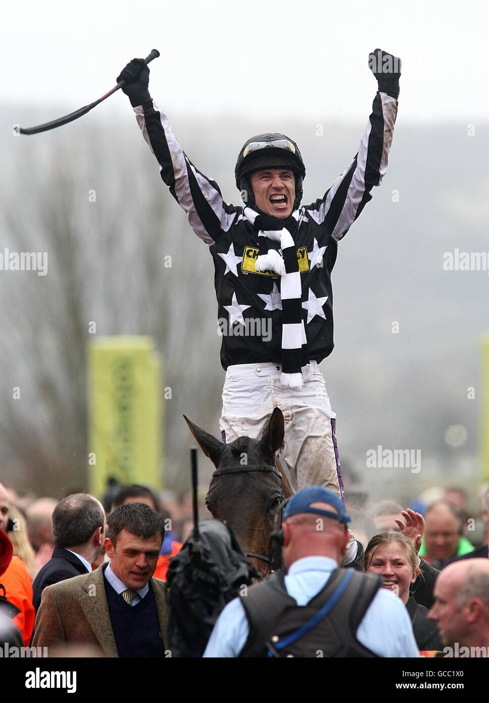 Paddy Brennan celebrates winning the Totesport Cheltenham Gold Cup ...