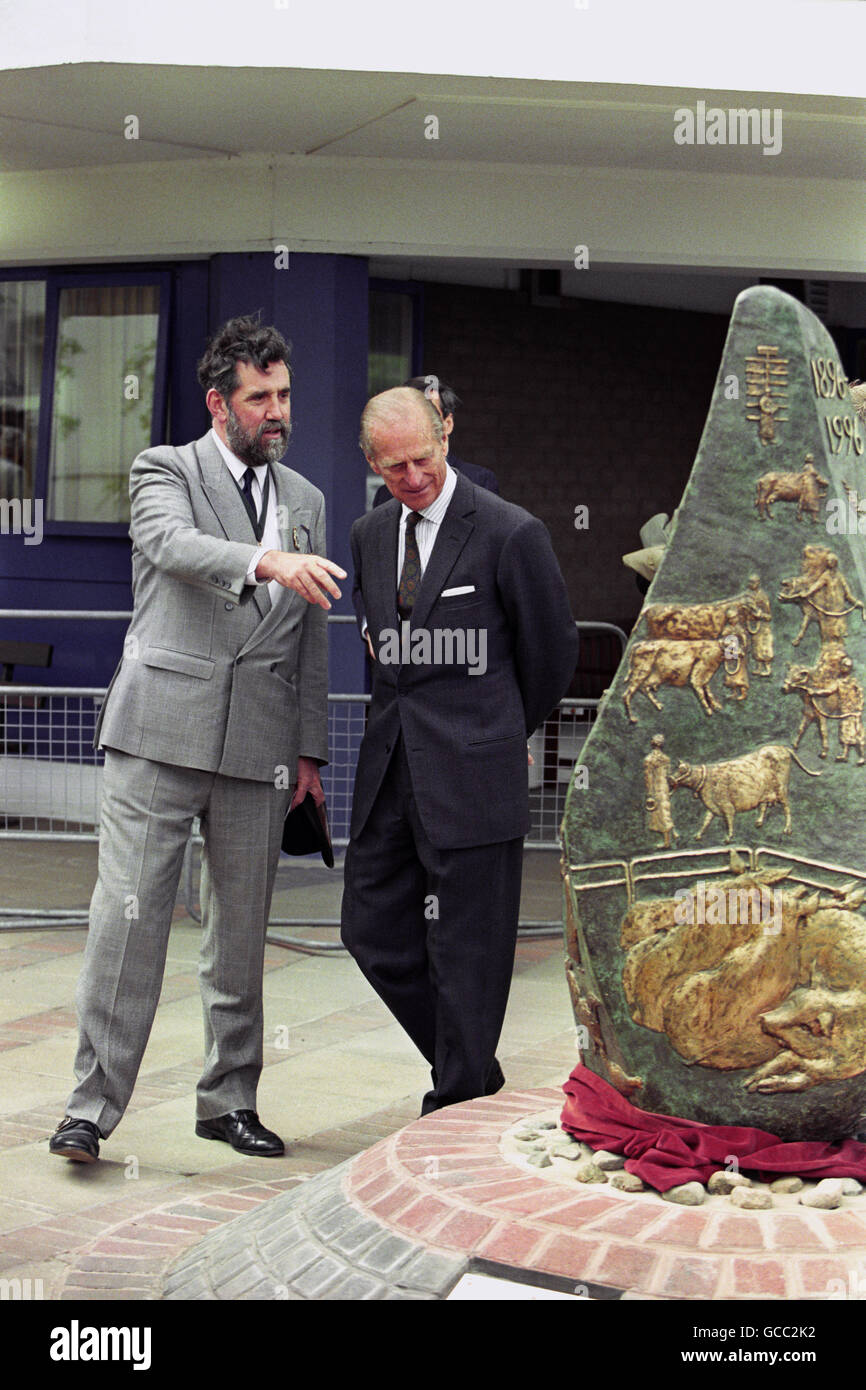THE DUKE OF EDINBURGH PERUSES A FEATURE, POINTED OUT BY RUAS PRESIDENT ...