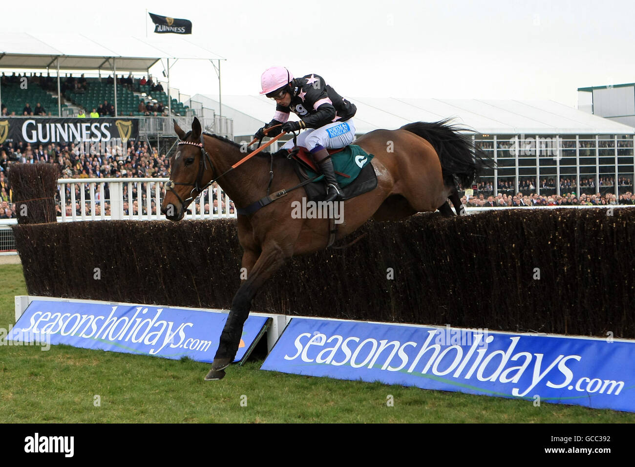Jockey Sam Waley-Cohen on Far More Serious jumps a fence during the ...