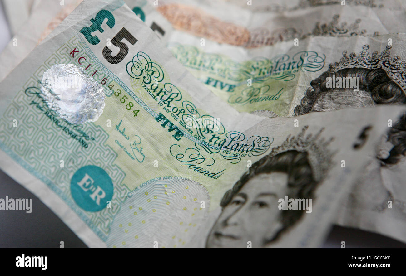 A close up view of five and ten pound notes Stock Photo - Alamy