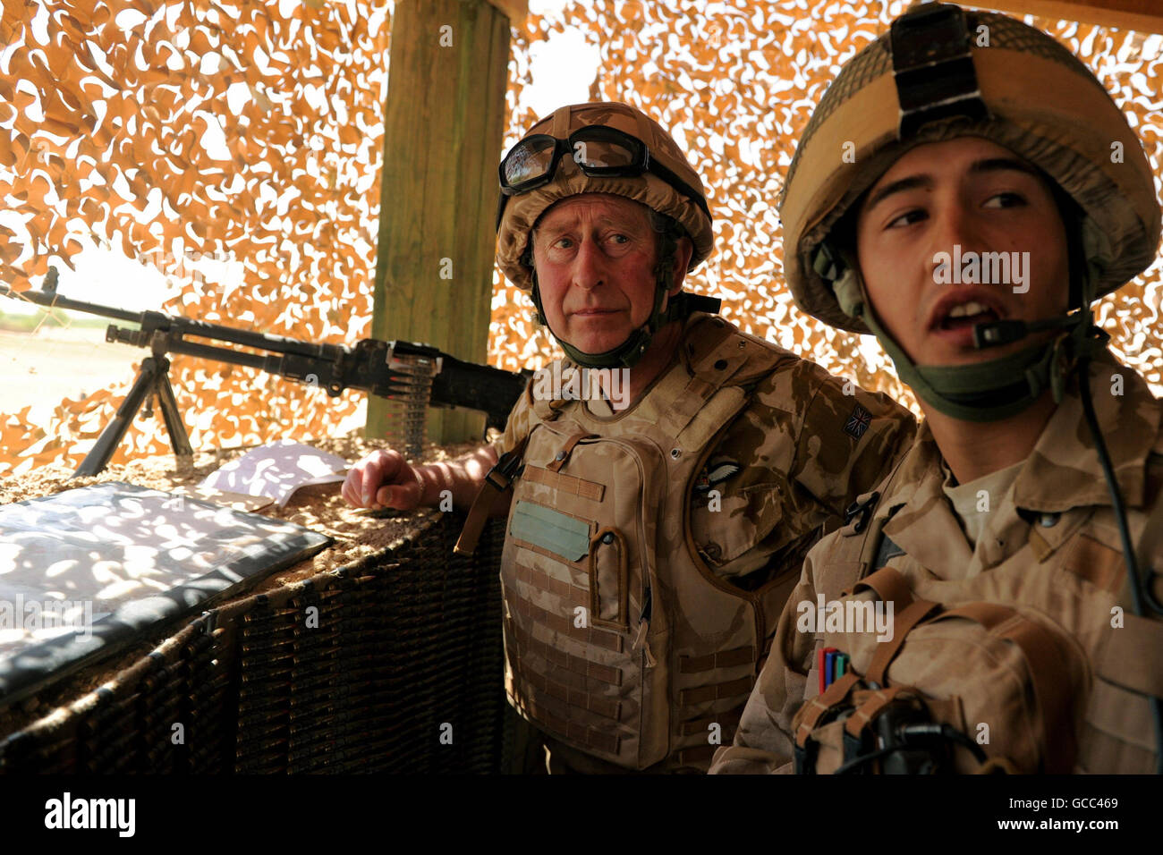 The Prince of Wales (left) listens to a British soldier at British ...