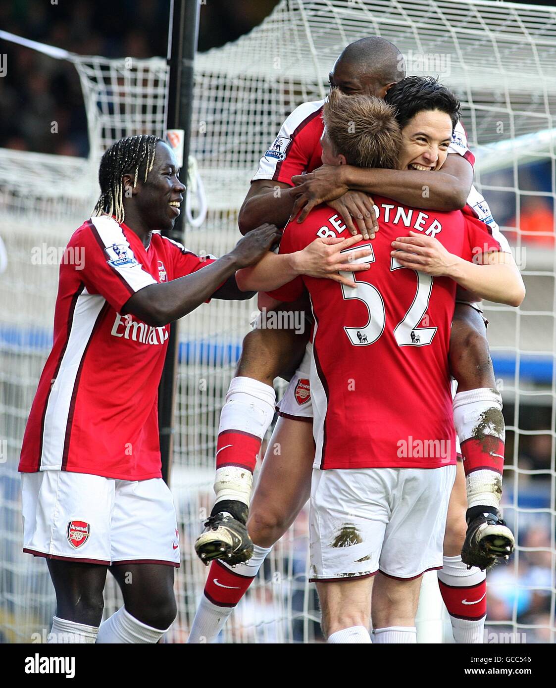 Arsenal's Samir Nasri (right) celebrates with his team mates after ...