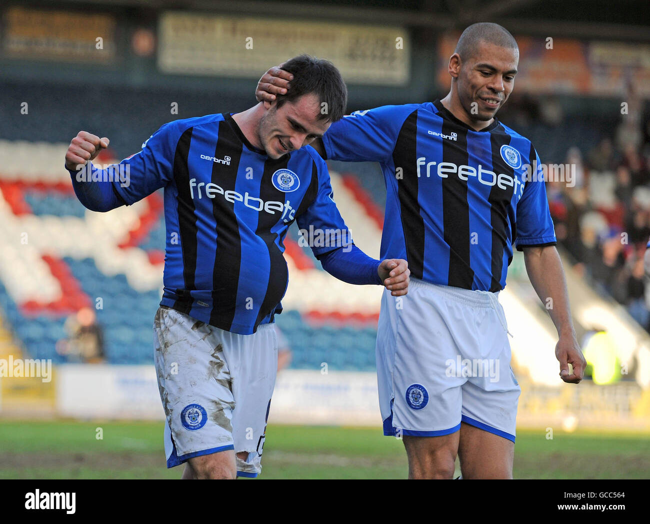 Rochdale's Chris Dagnall (left) celebrates after scoring his hat-trick ...