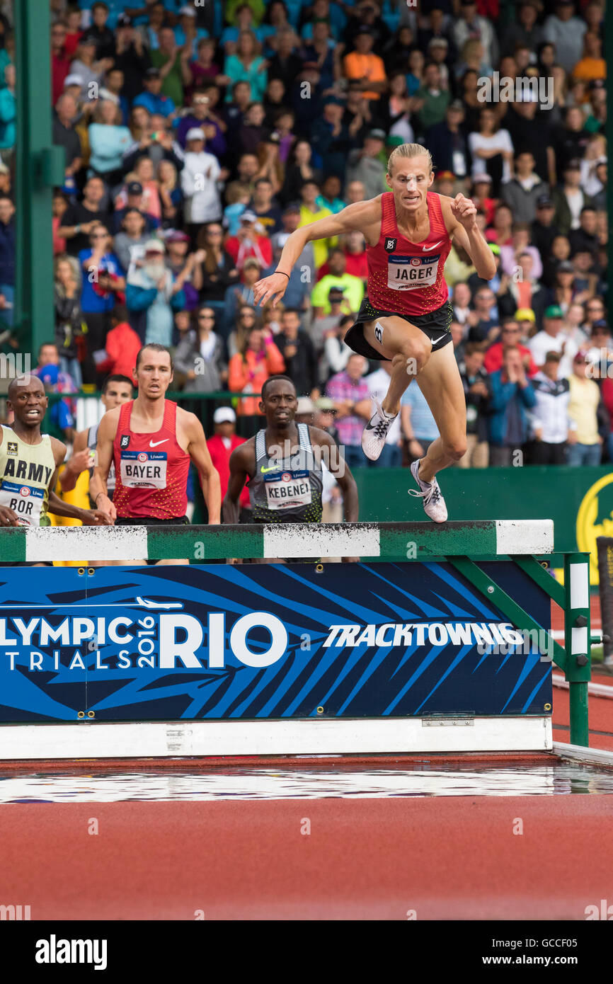 Eugene, USA. 8th July, 2016. Runners come over the water obstacle in ...
