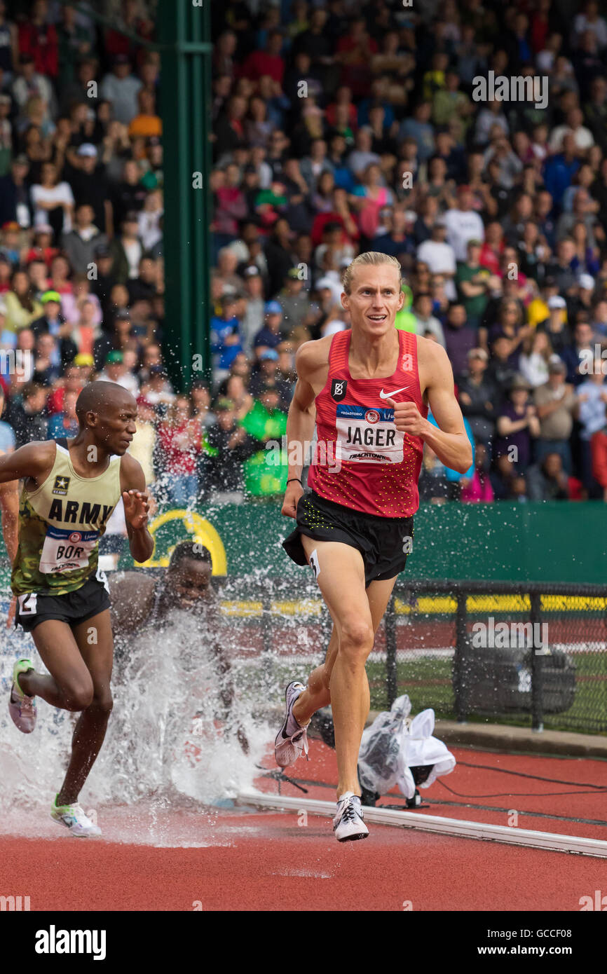 Eugene, USA. 8th July, 2016. Runners come over the water obstacle in ...