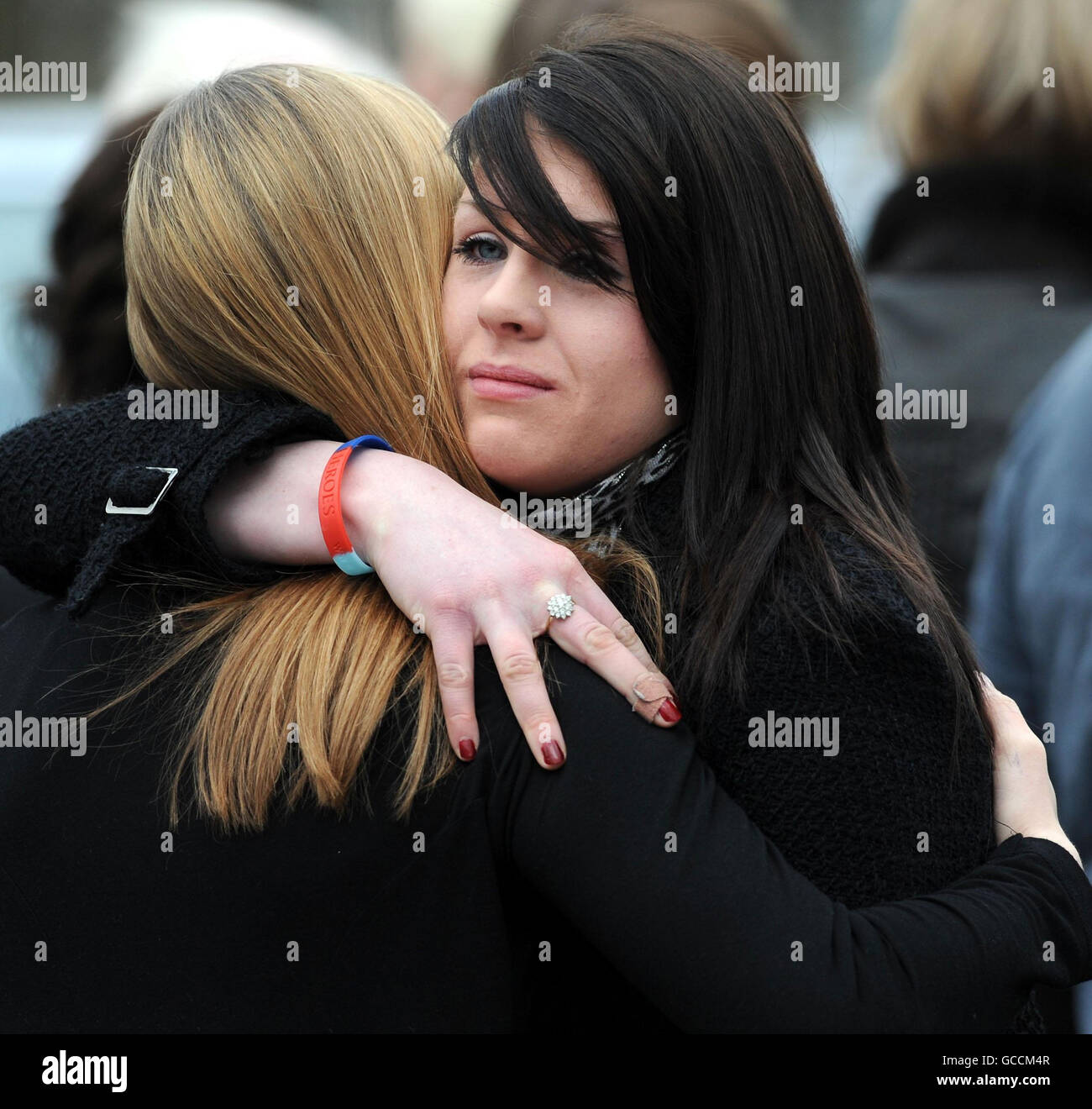 Mourners pay their respects at the funeral for Kingsman Sean Dawson at ...