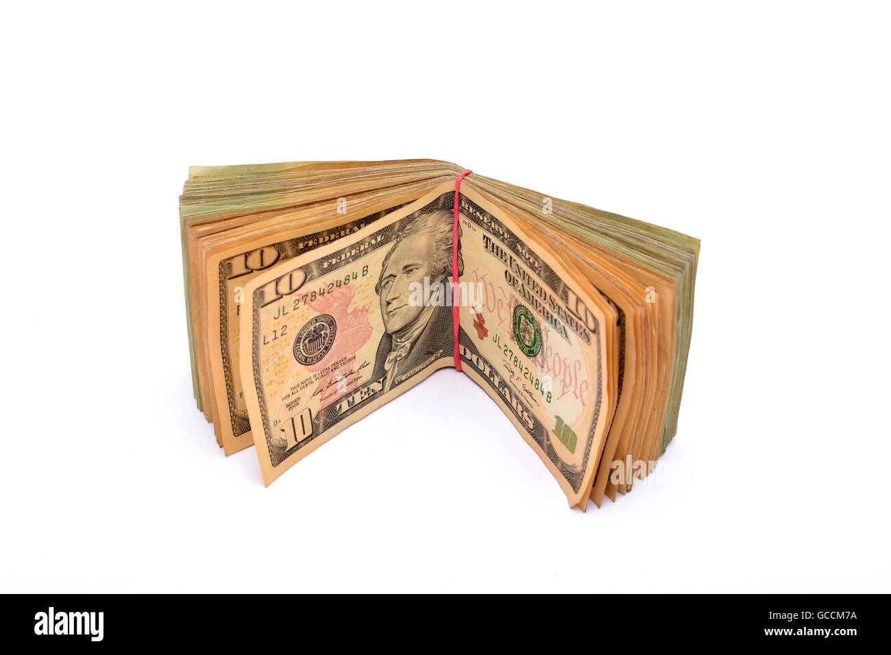 Money stack currency notes on white background Stock Photo - Alamy