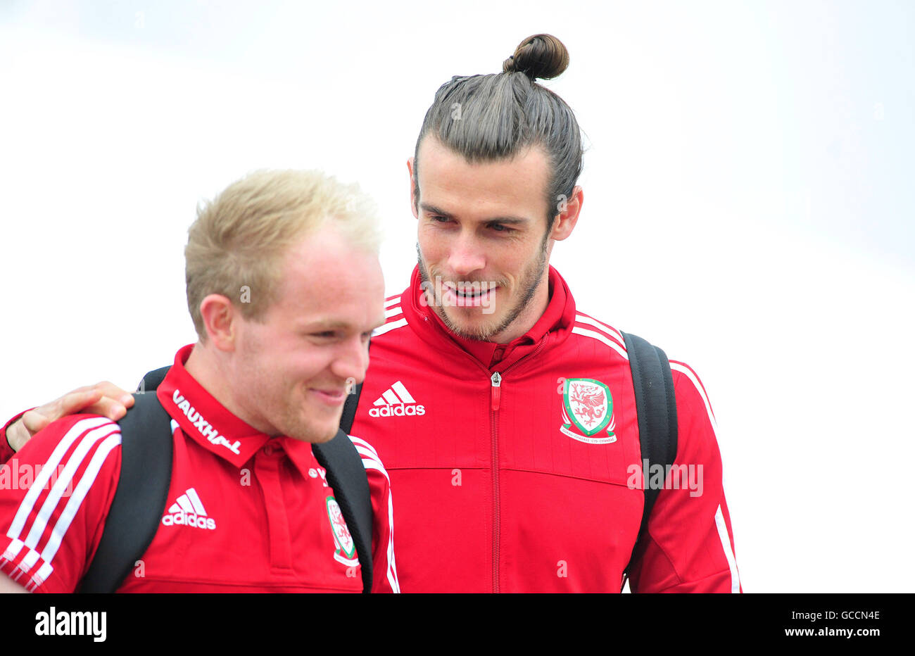 Wales' Jonathan Williams and Gareth Bale (right) arrive back at Cardiff ...