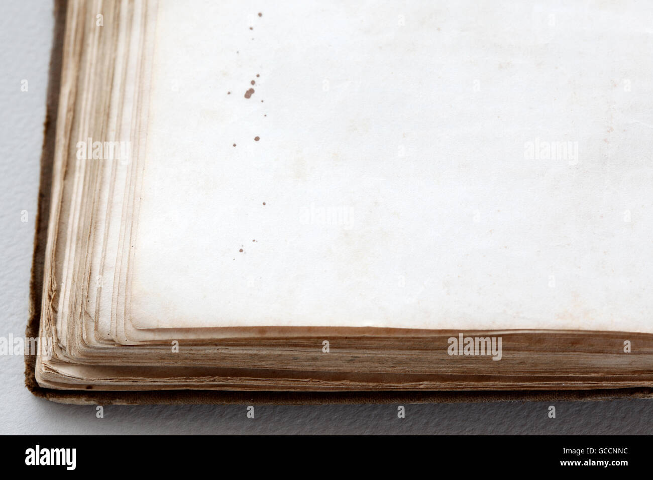 Part of old open book Stock Photo - Alamy