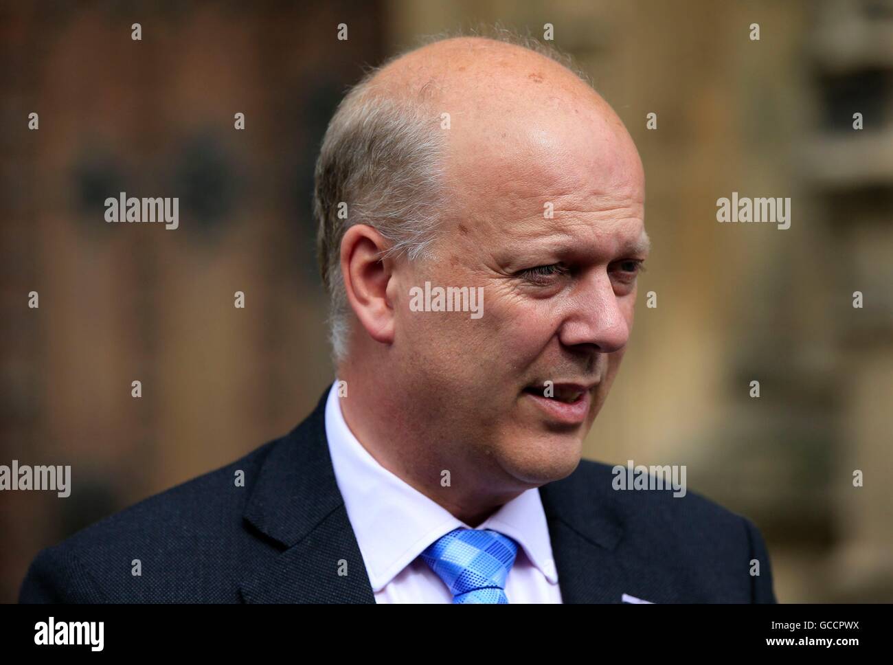 Chris Grayling outside the Palace of Westminster, in London, after ...