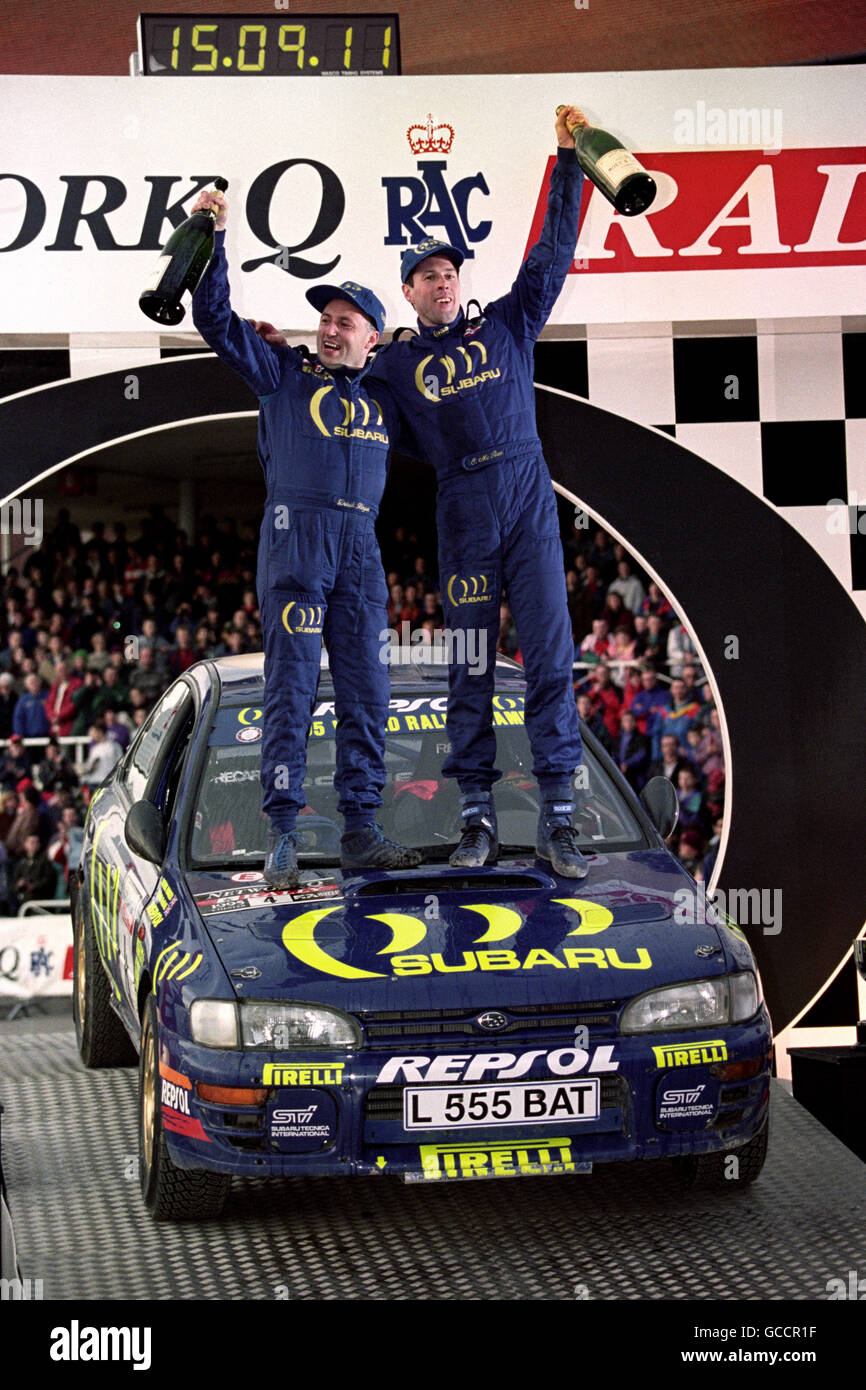 Colin McRae, right, and his co driver Derek Ringer celebrate their ...