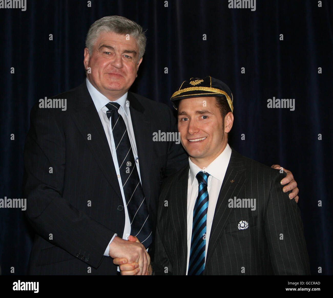 SRU President Jim Stevenson (left) presents Scotland's Dan Parks with ...