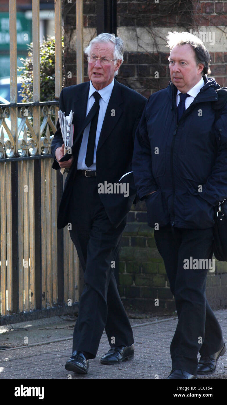 Michael Meacher (left) arrives at Golders Green Crematorium for the ...