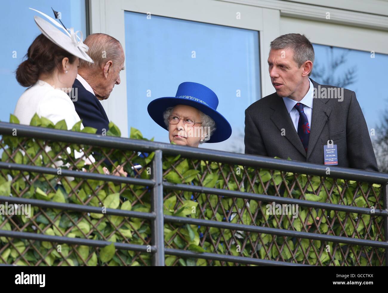 Queen Elizabeth II watches the races from the Queen's Stand with the ...