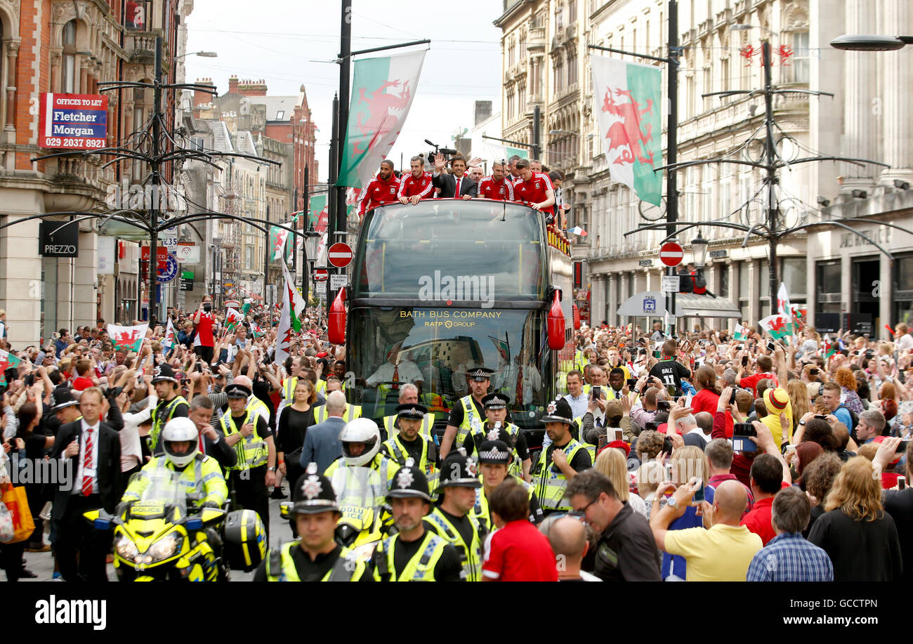 Wales players and manager Chris Coleman acknowledge the fans on a open ...