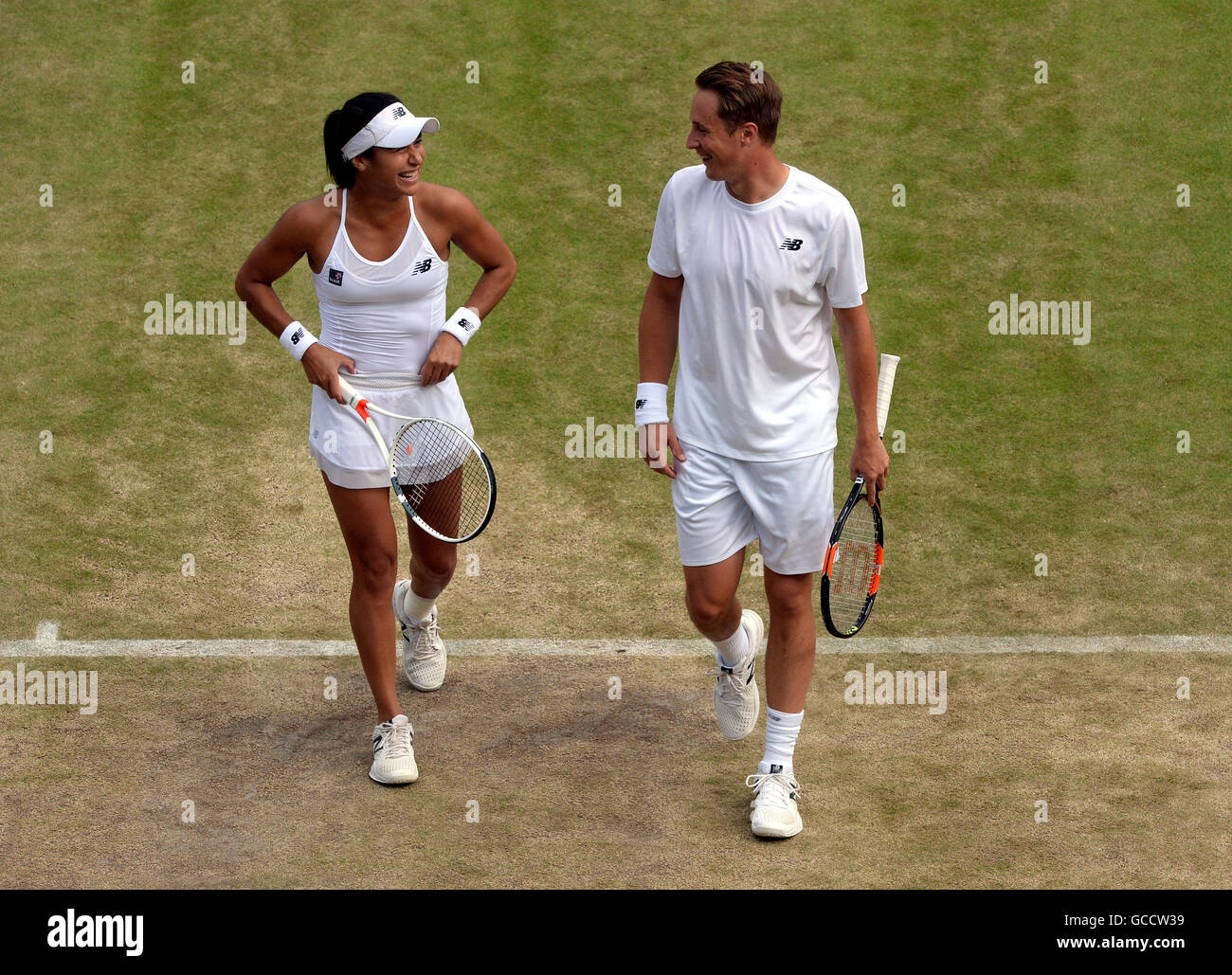 Heather Watson and partner Henri Kontinen in action in their doubles ...
