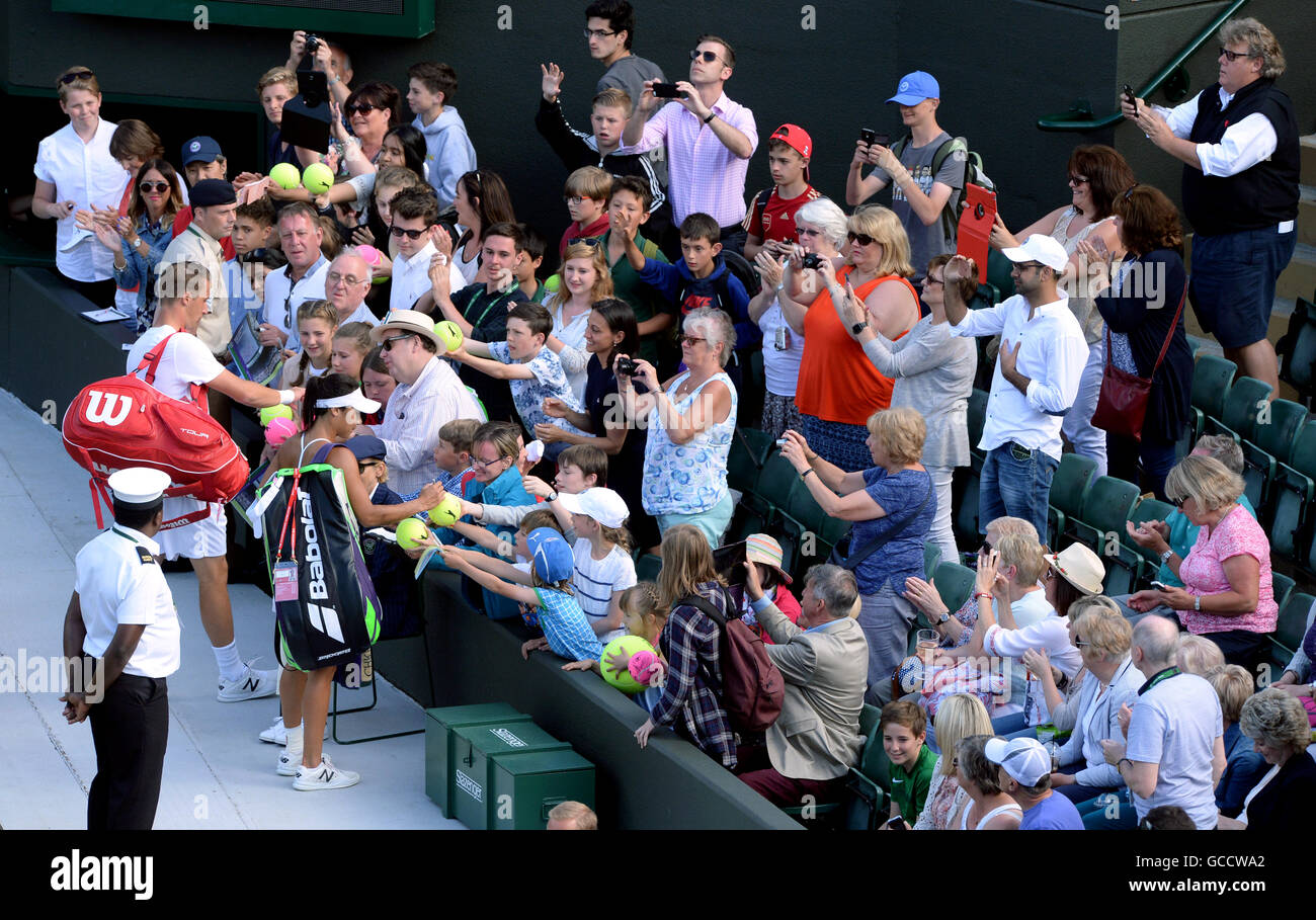 Heather Watson and partner Henri Kontinen sign autographs following ...