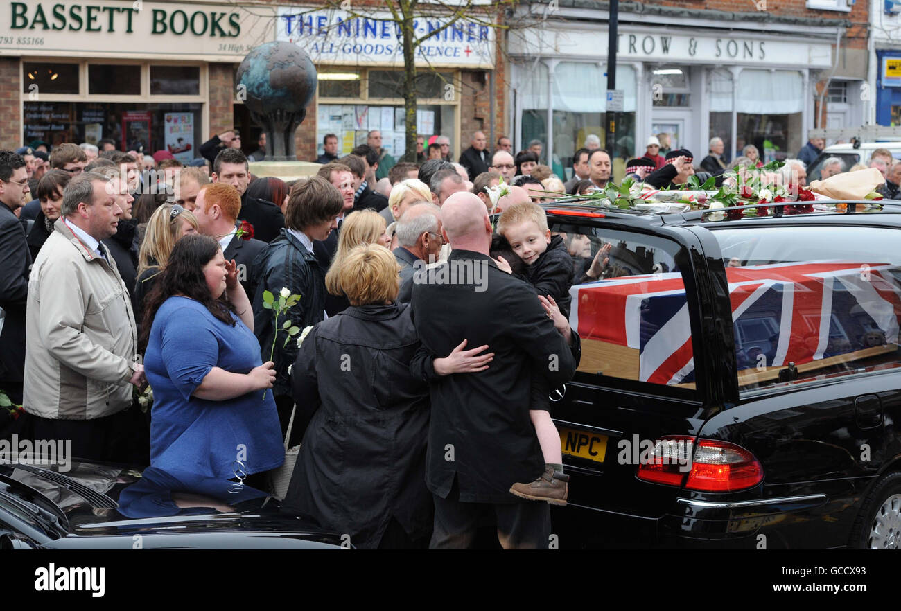 Mourners pay their respects as the coffins of Lance Corporal Scott ...