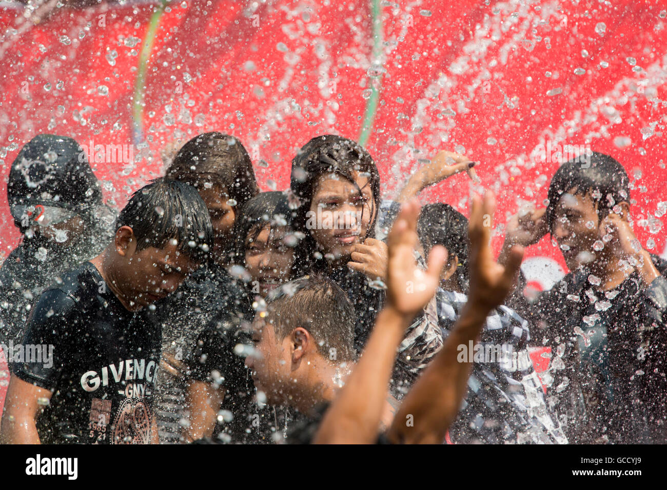 People at the Waterparty at the Thingyan Water Festival at the Myanmar ...