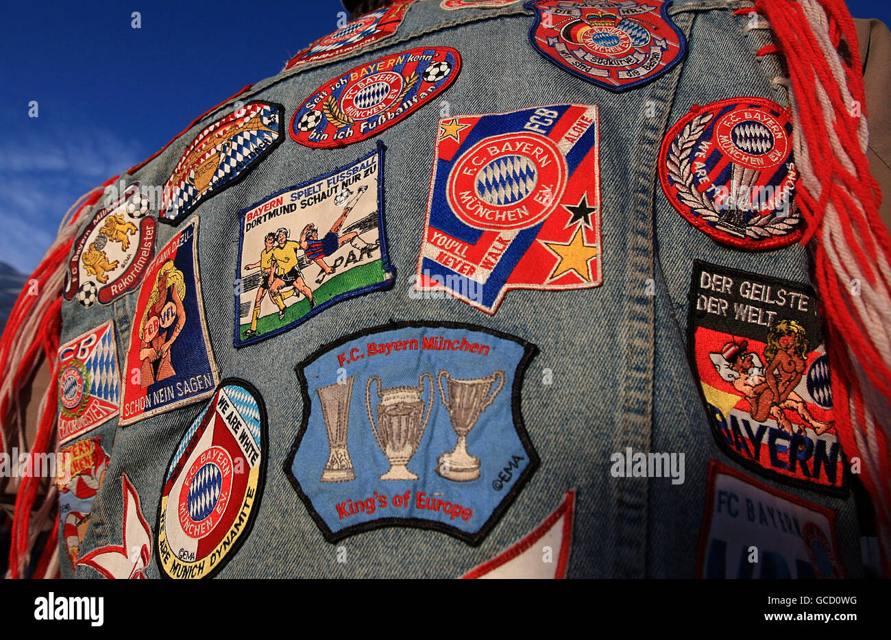 A Bayern munich fan wearing badges at the Allianz Arena Stock Photo - Alamy