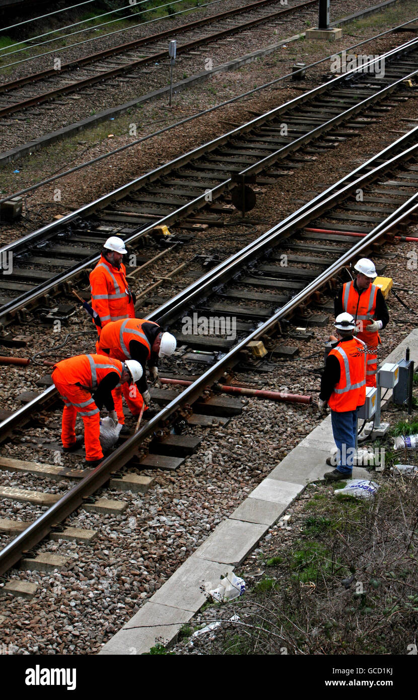 Network Rail engineers work on the track near to Cambridge City train ...
