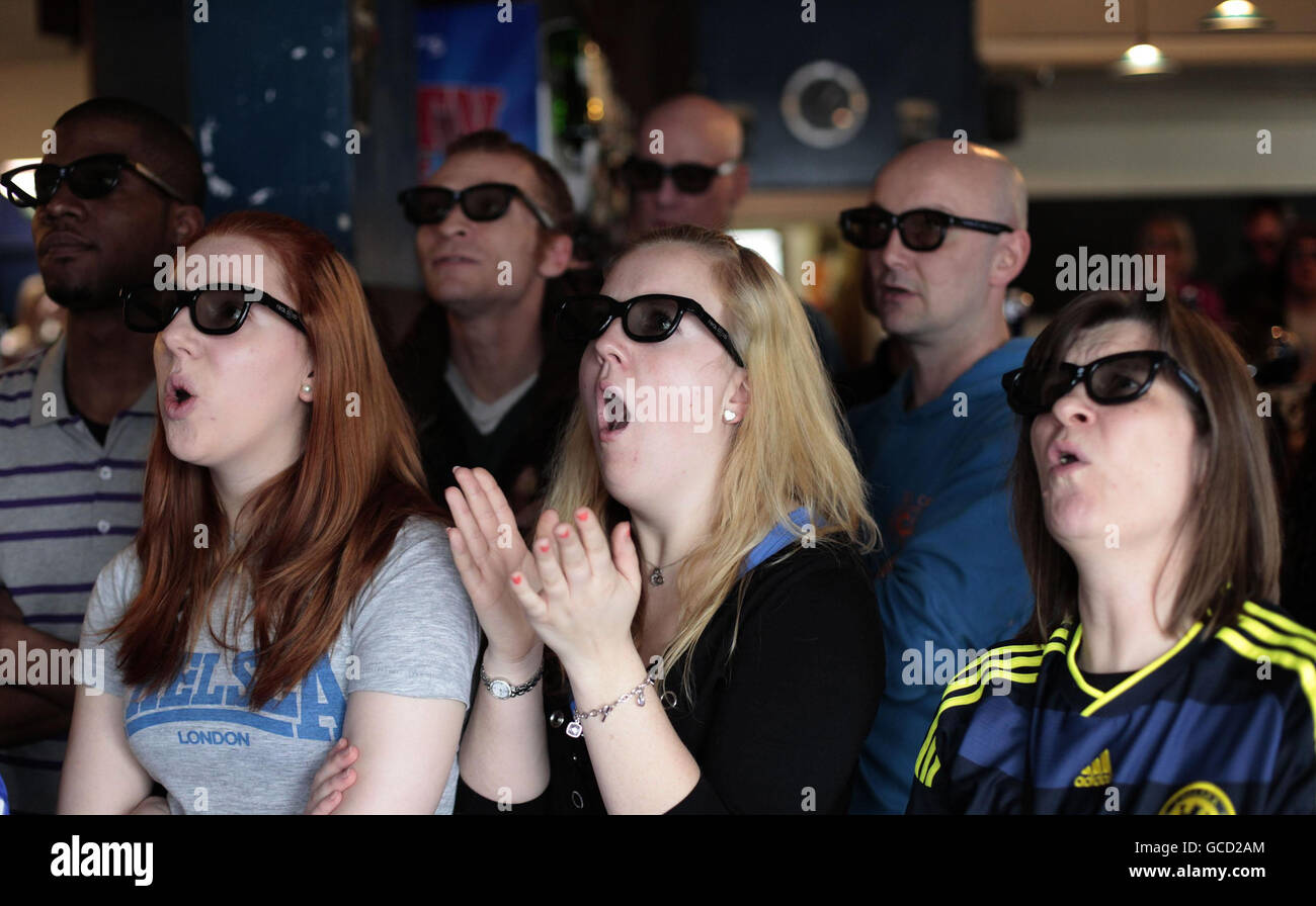Chelsea fans, wearing 3D glasses at Riley's pub in Kings Road, London ...