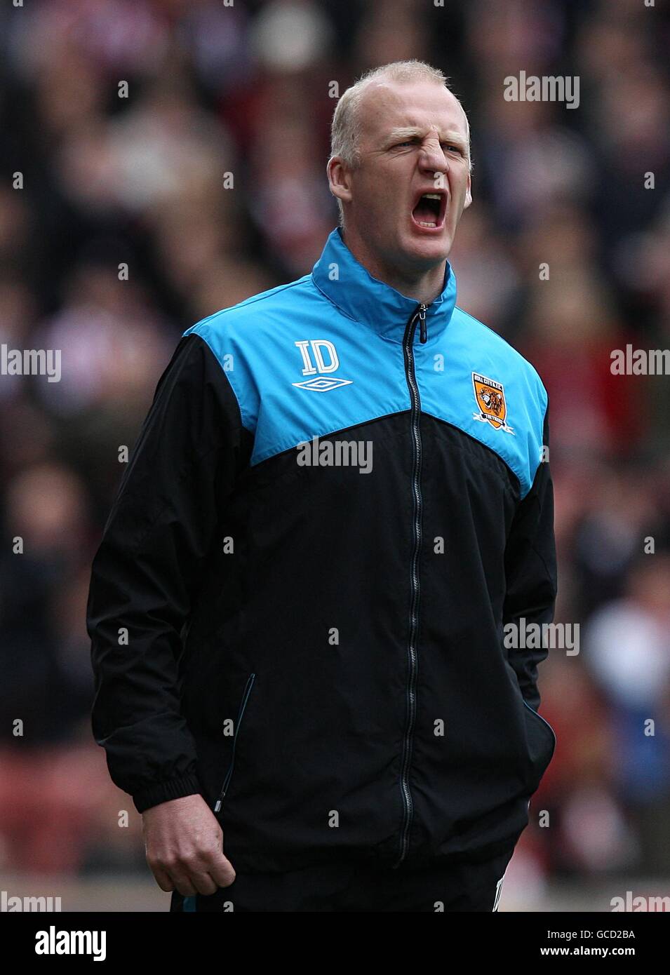 Hull City's Temporary Football Management Consulatant Iain Dowie shouts ...