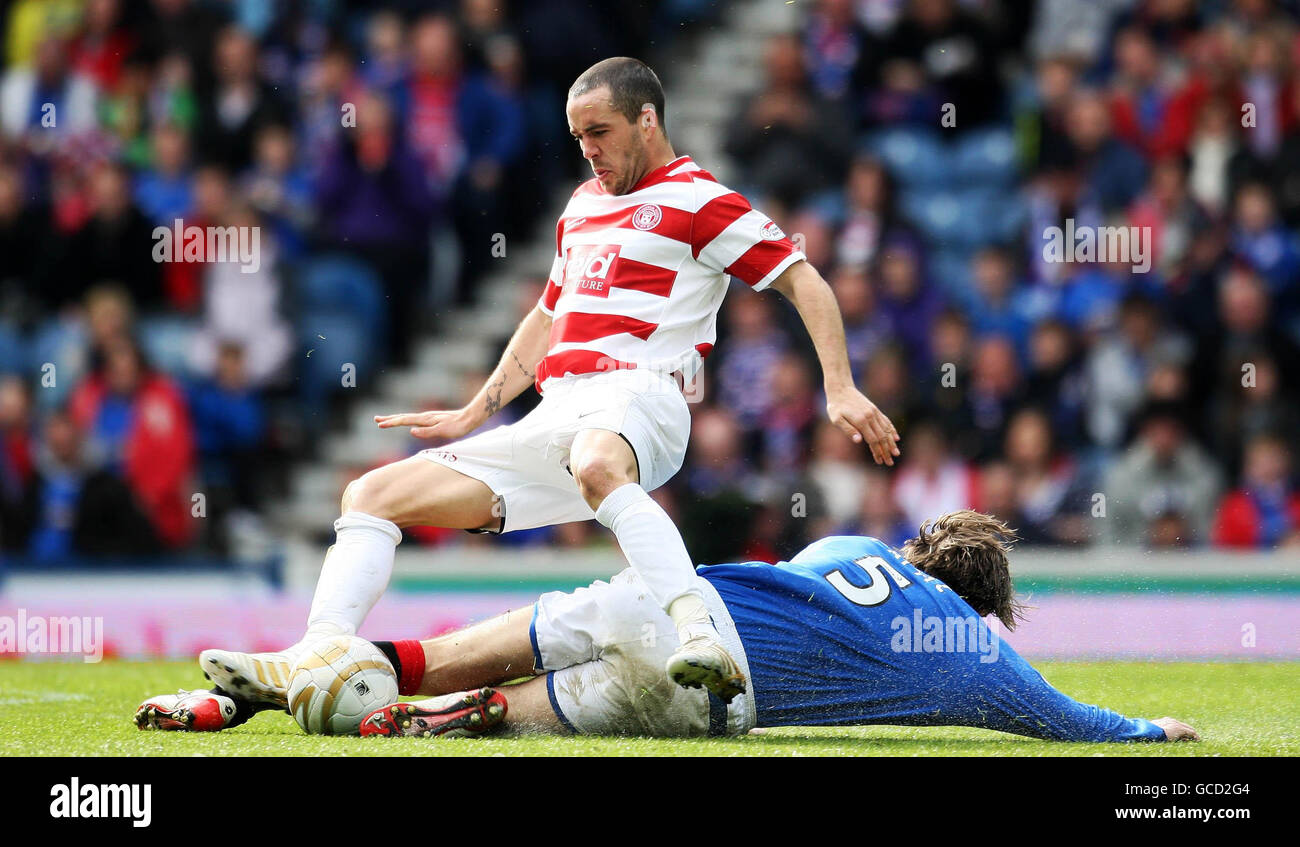 Rangers Sasa Papac and Hamilton's Dougie Imrie battle for the ball ...