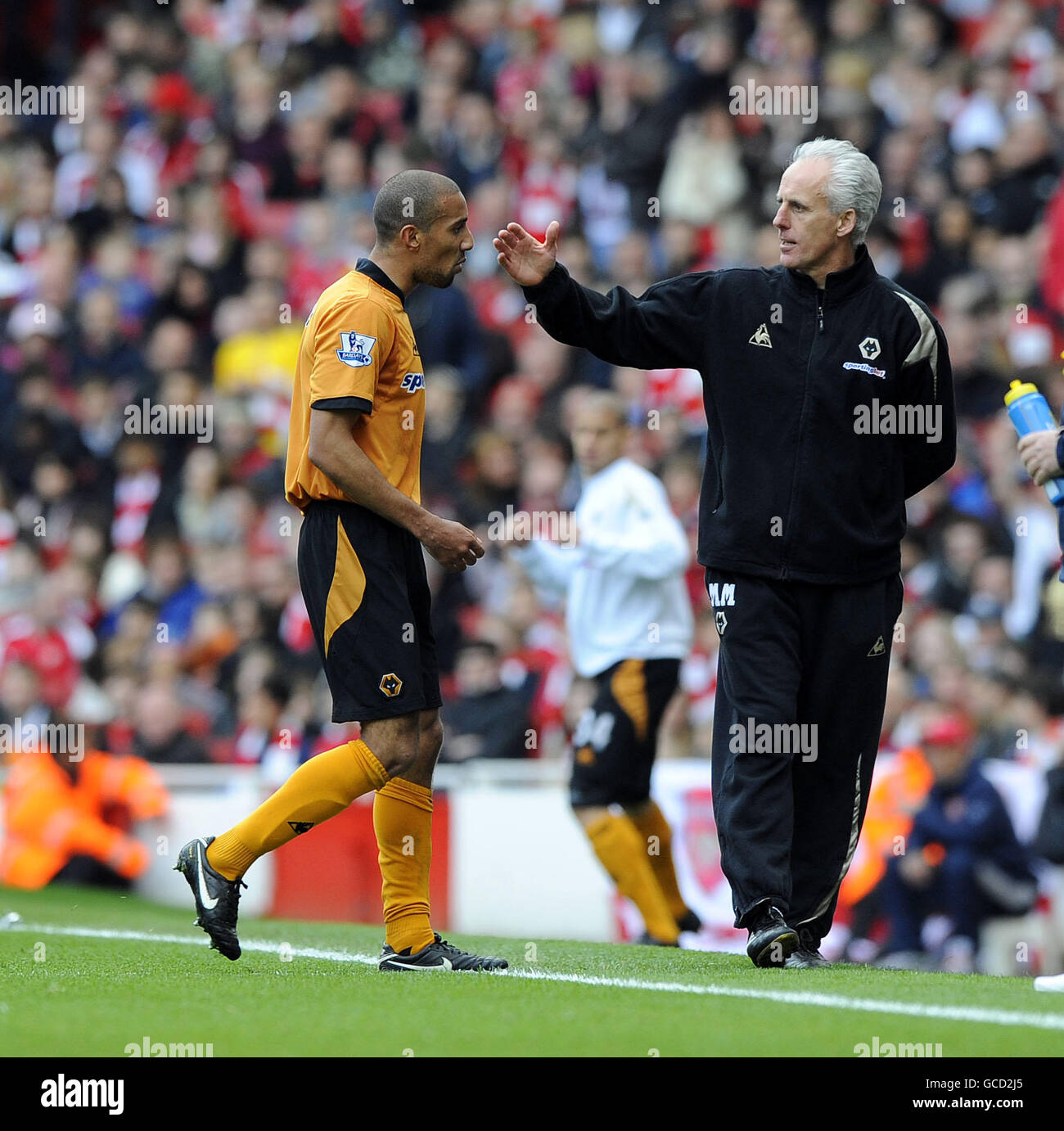 Wolverhampton Wanderers Karl Henry (L) in consoled by manager Mick ...