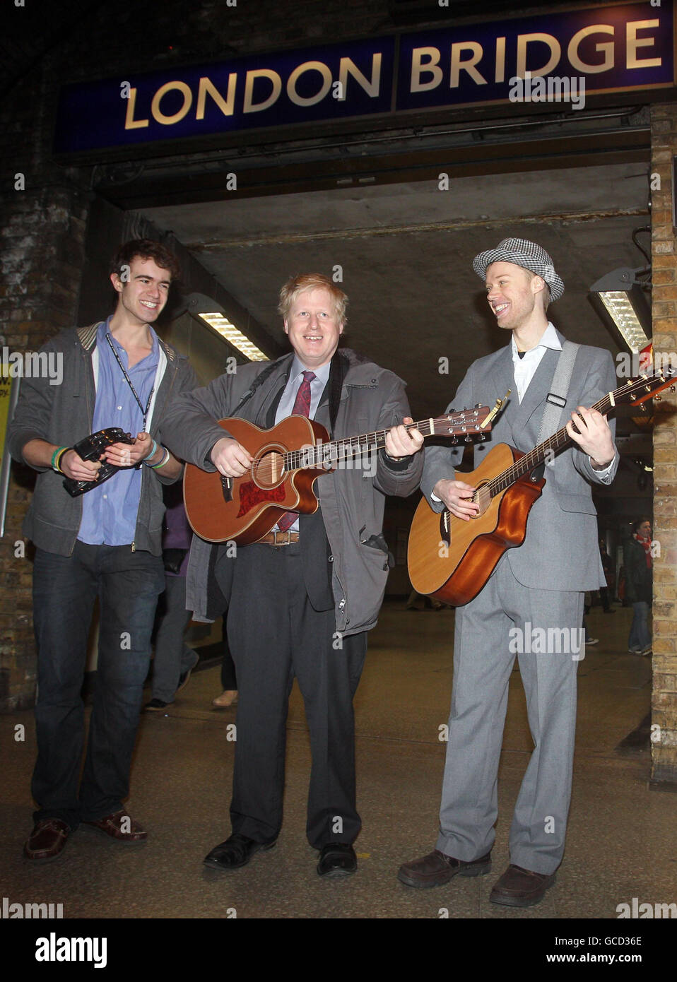 London Mayor Boris Johnson busking with last years winner Jamie West ...