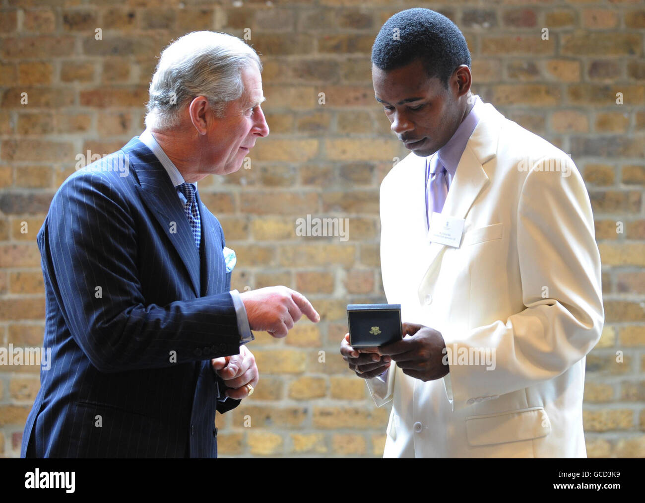 The Prince of Wales meets carpenter Calvin Hall who has won the Hancock ...