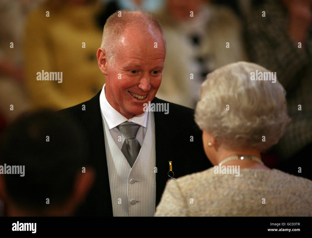 Dr. Stephen Liversedge from Bolton is made an MBE by Queen Elizabeth II ...