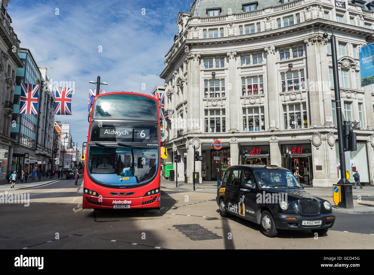 British city London street scene red bus and taxi cab Stock Photo - Alamy