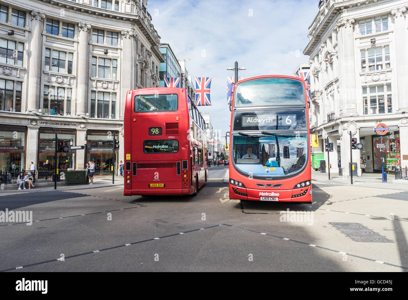 Public transport London Red Buses on city street Stock Photo - Alamy