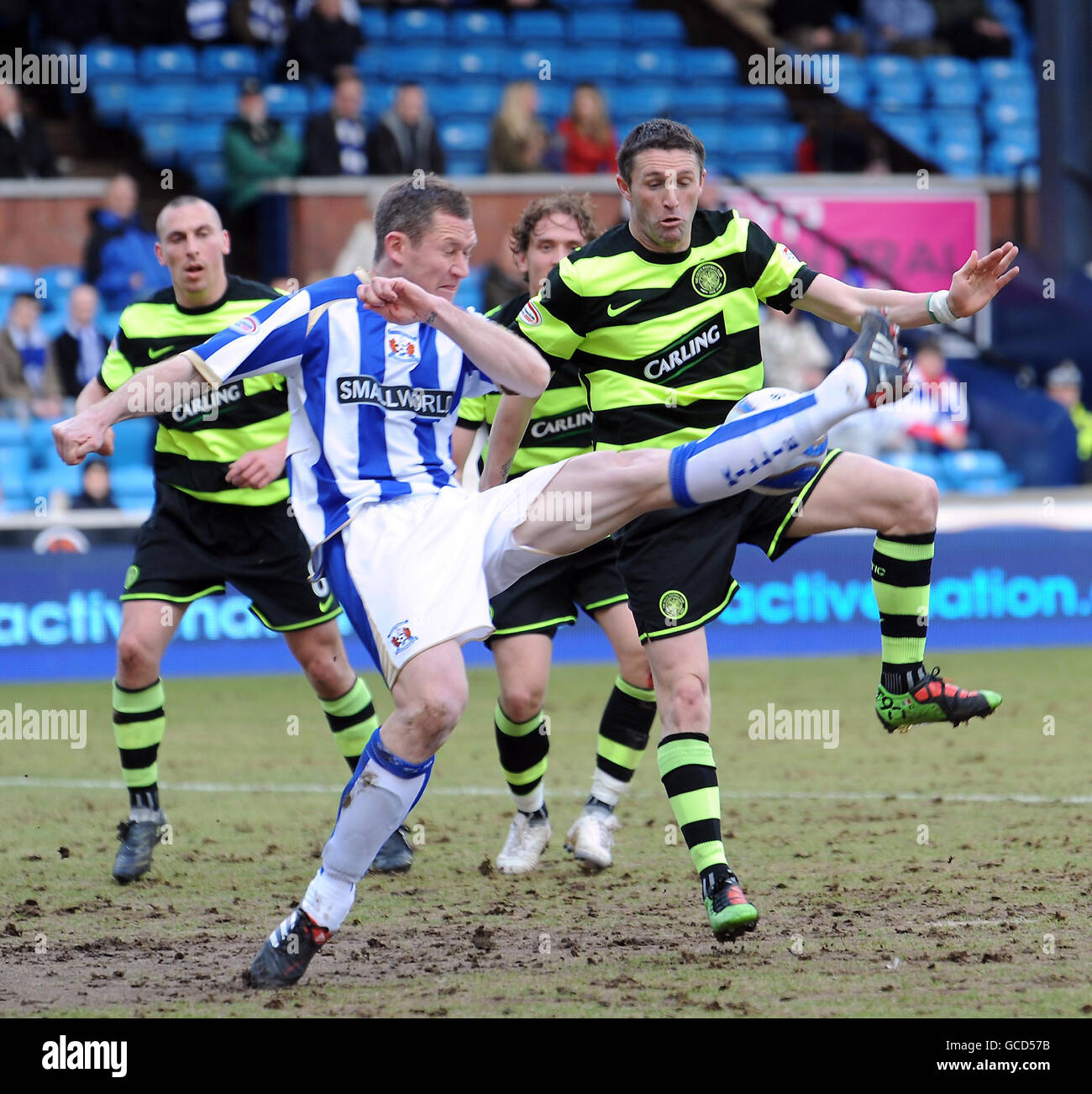 Celtic's Robbie Keane and KIlmarnock's Frazer Wright battle for the ...