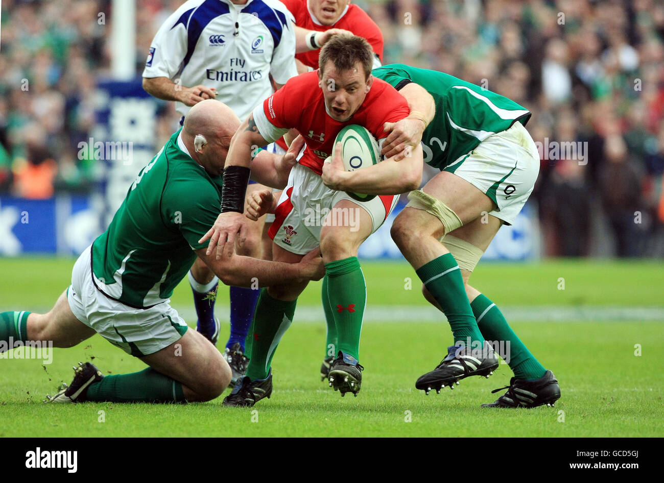Wales's Matthew Rees tries to break away from Ireland's John Hayes and ...