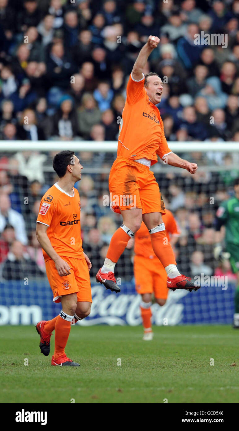 Blackpool's Charlie Adam (right) celebrates after he scores his sides ...